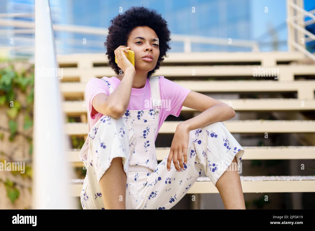 Serious black woman talking hi-res stock photography and images - Alamy