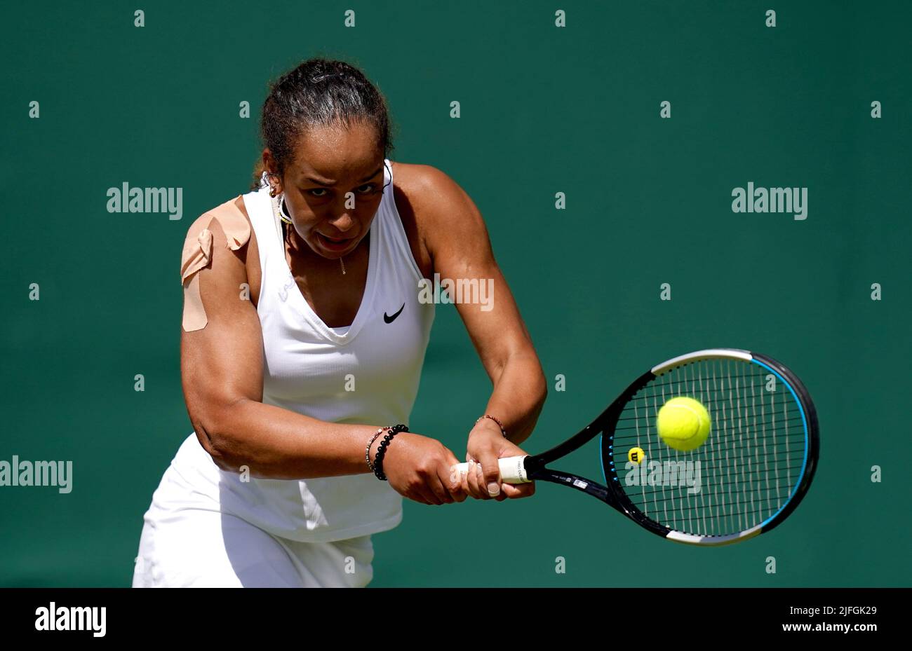 Sofia Johnson in action during her Girls Singles first round match against Victoria Mboko during ...