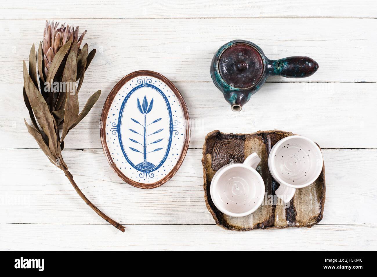 Flat lay of rustic dishes for tea Stock Photo - Alamy