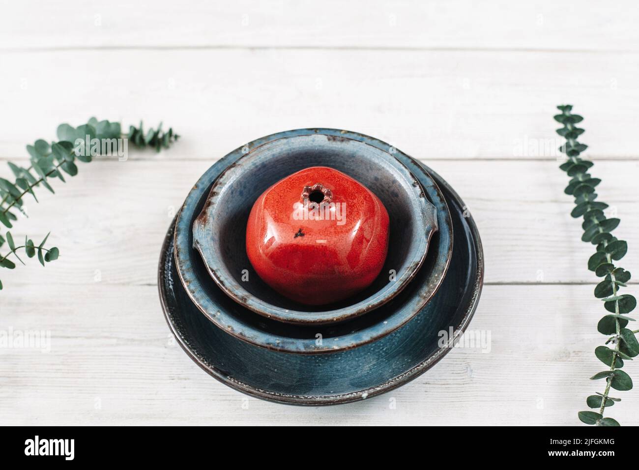 Handmade pottery house decor on white background Stock Photo - Alamy