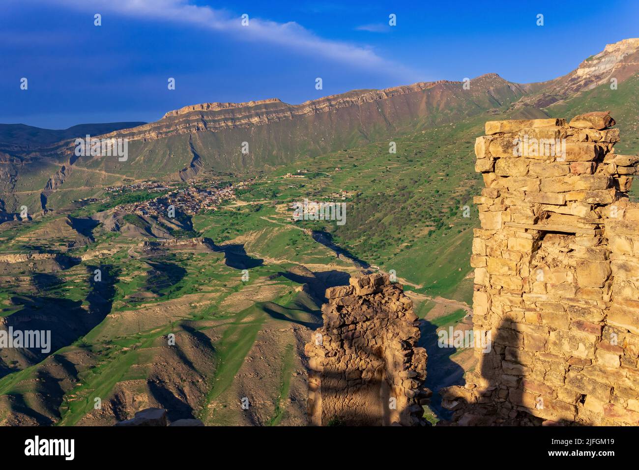 walls of abandoned houses on a mountain cliff in the ghost village of ...