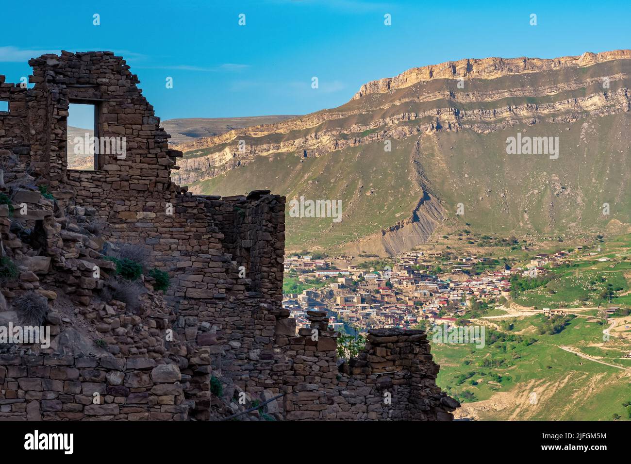 walls of abandoned houses on a mountain cliff in the ghost village of ...