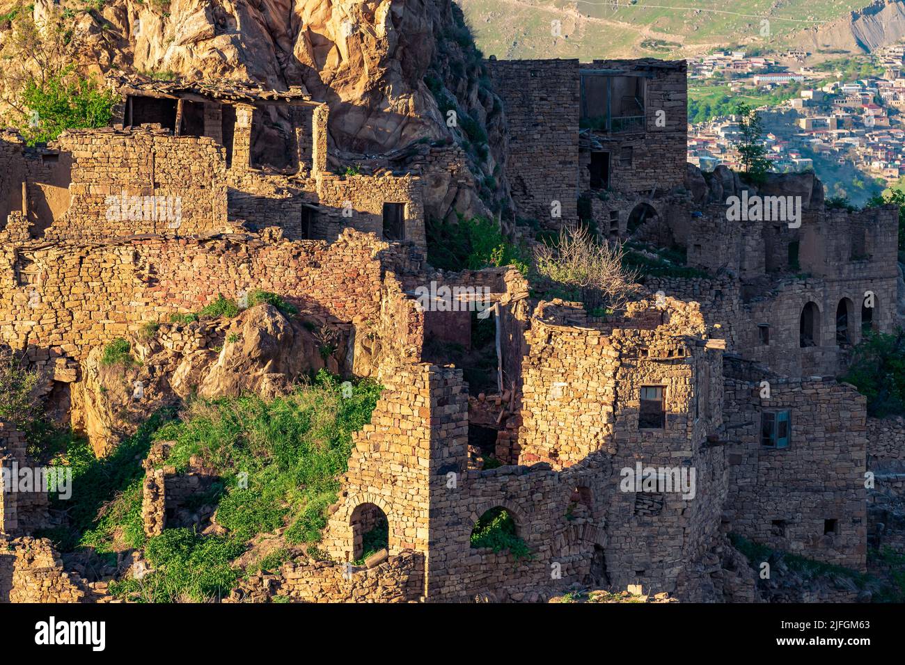 walls of abandoned houses on a mountain cliff in the ghost village of ...