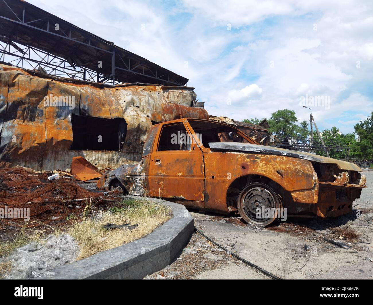 Destroyed car on the street as a result of the attack of Russian ...