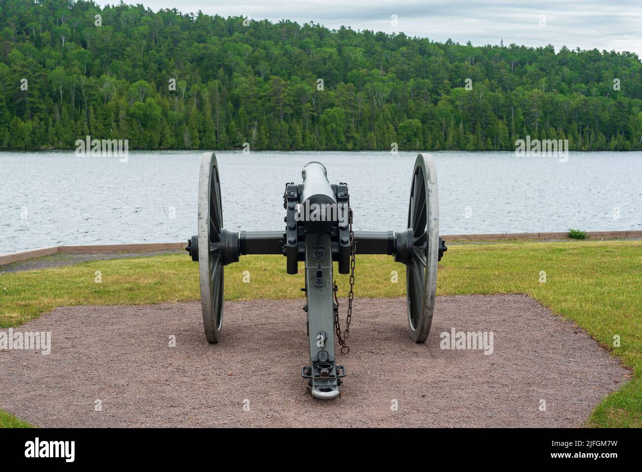 Historic black powder cannon standing guard over a shoreline Stock ...
