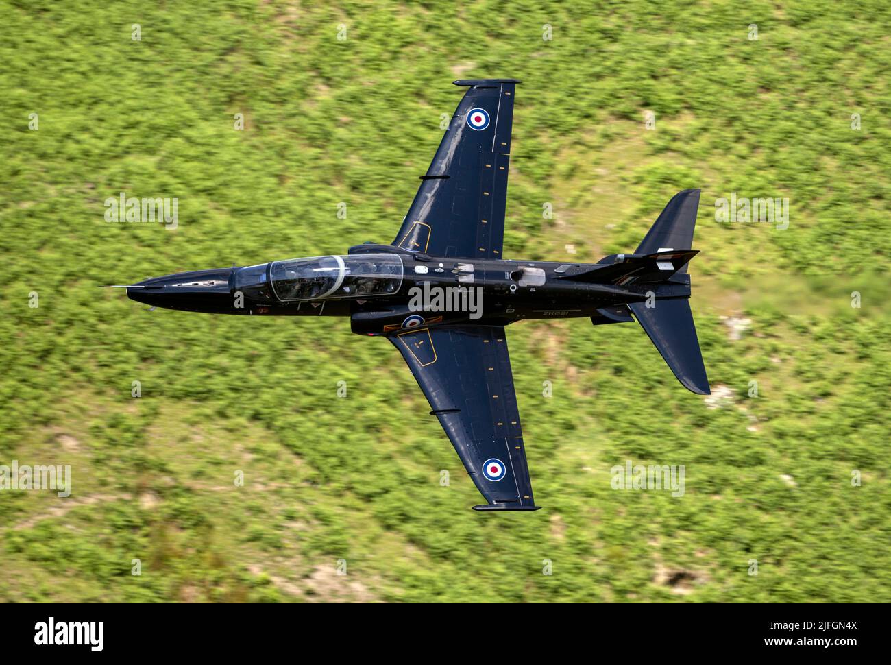 RAF Hawk T2 jet trainer, on a low level flying mission through the ...