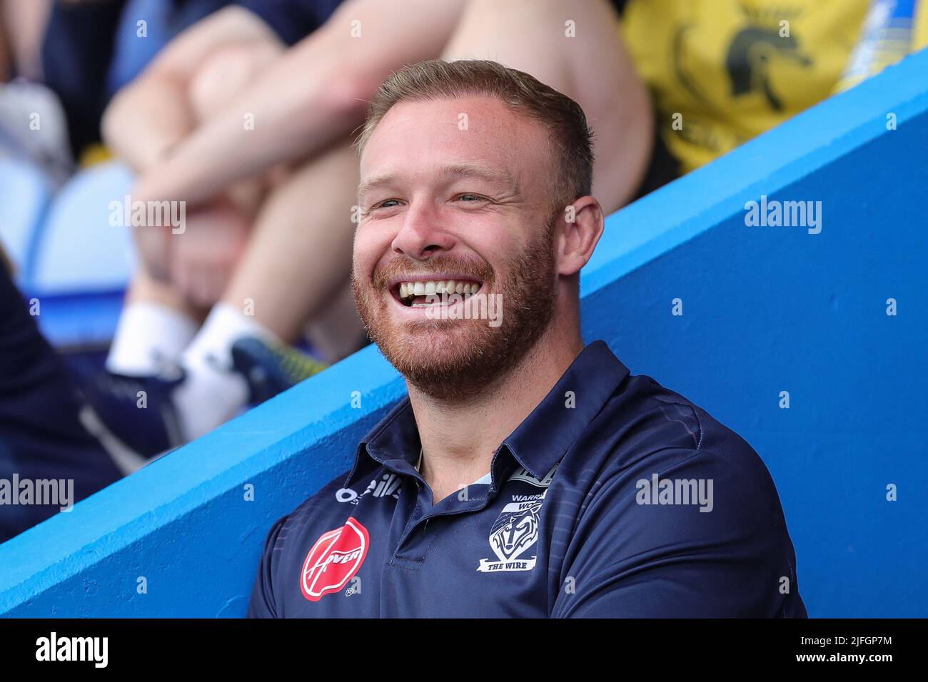 Oliver Holmes #12 of Warrington Wolves watches as the Warrington Wolves ...