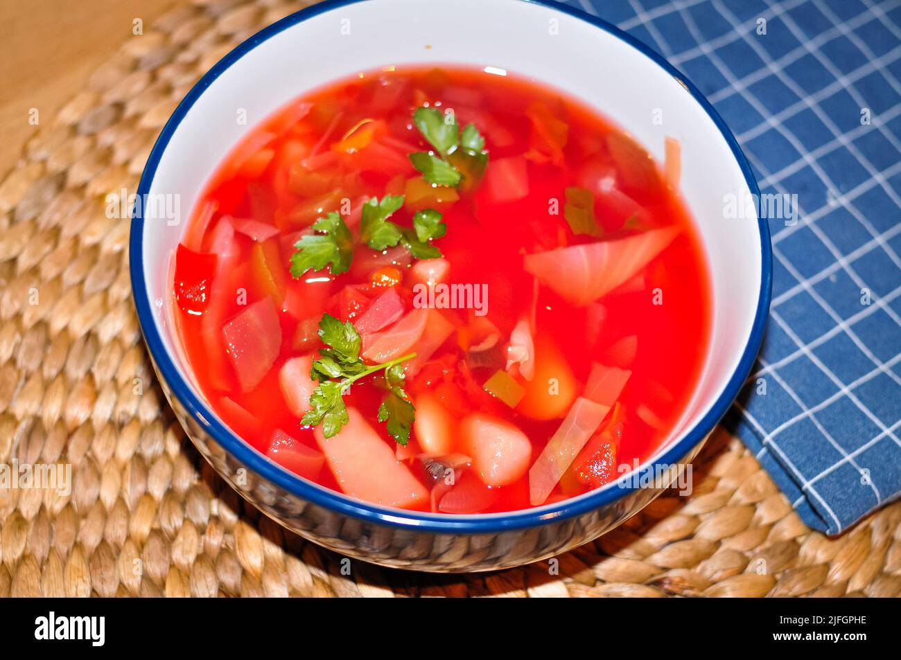 a plate of Ukrainian red national dish borsch soup ,which added to ...