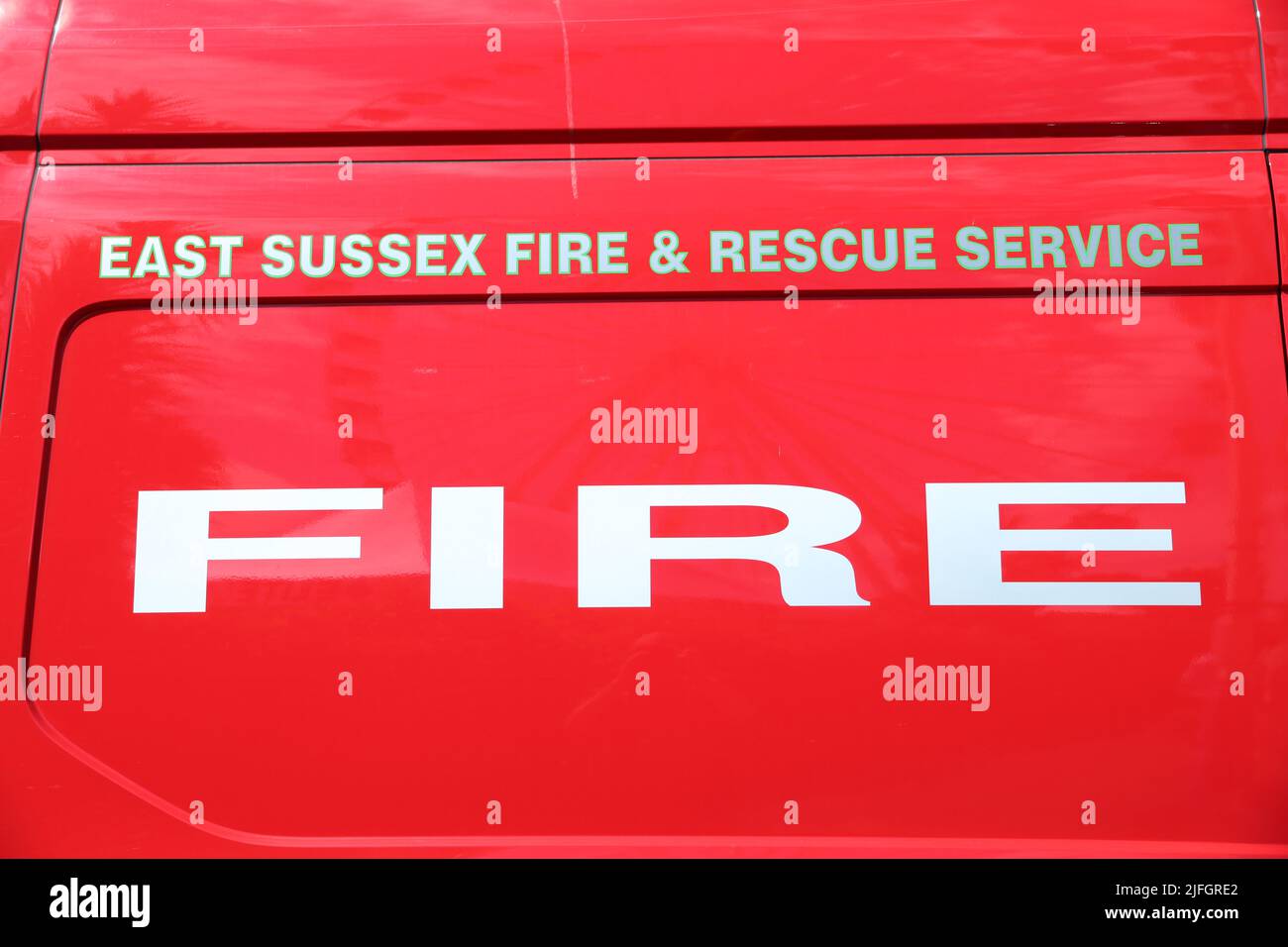 EAST SUSSEX FIRE & RESCUE SERVICE BADGE LOGO LETTERING Stock Photo - Alamy