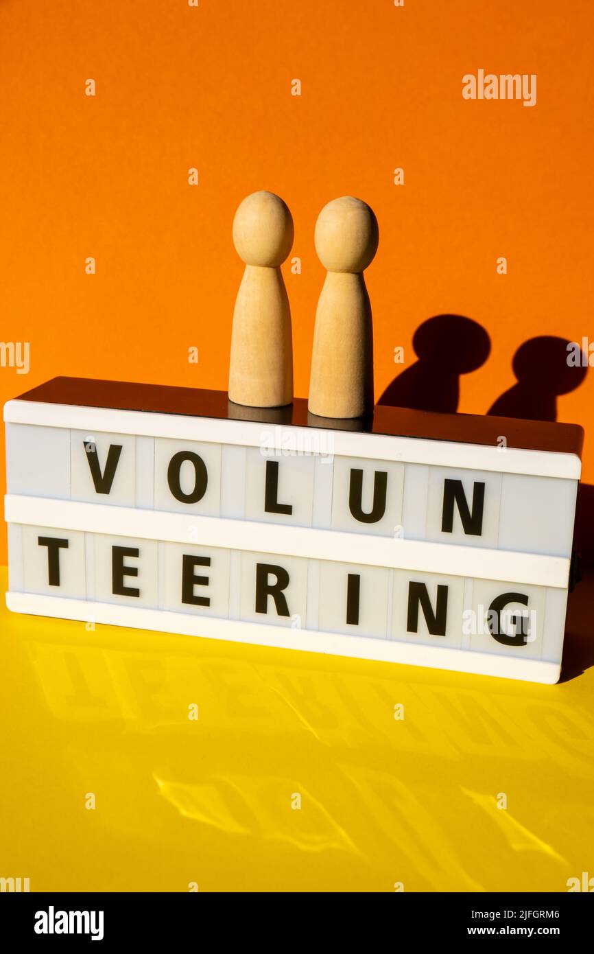 Lightbox with text VOLUNTEERING. Motivational Words Quotes Concept ...