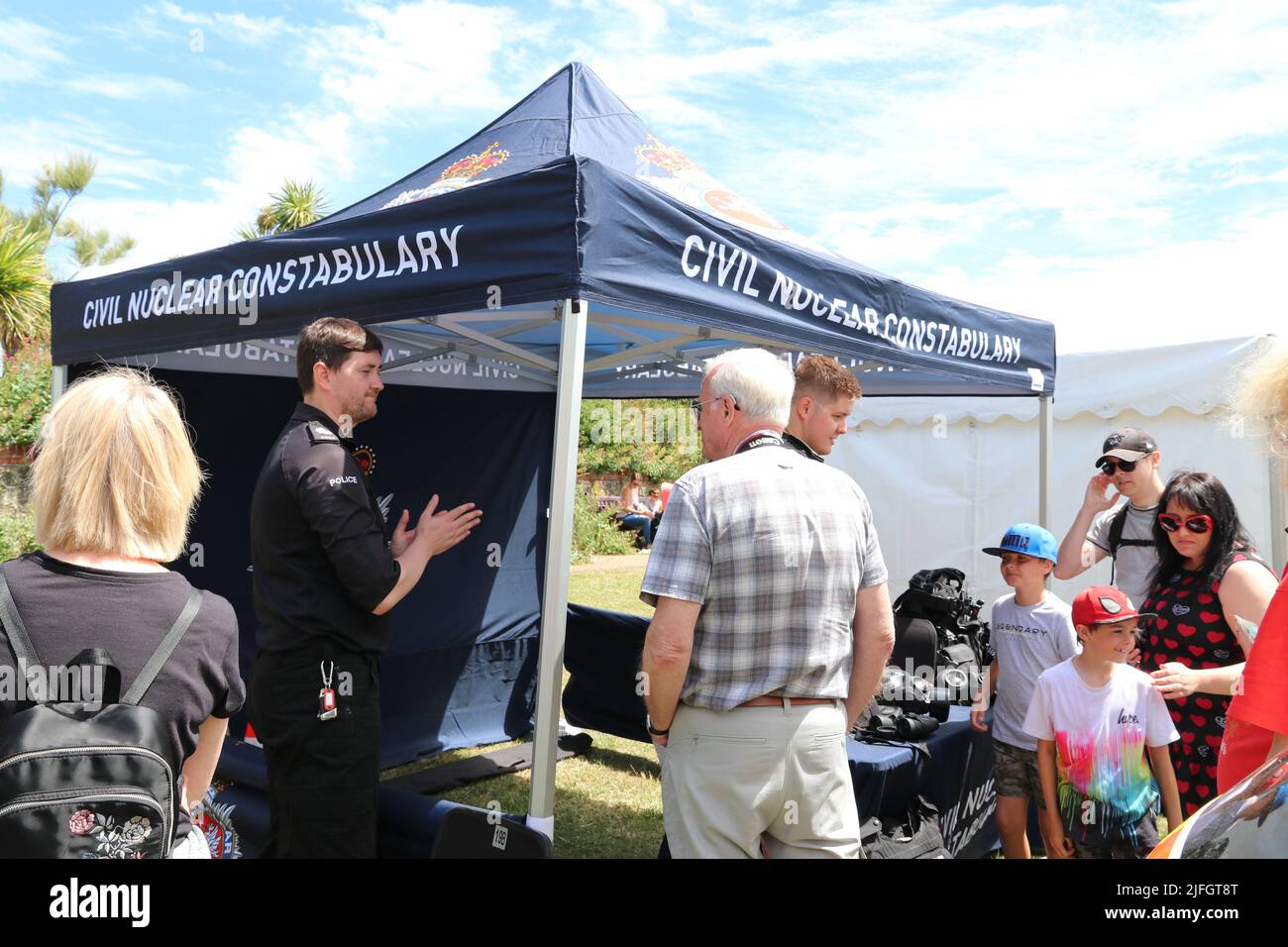 CIVIL NUCLEAR CONSTABULARY POLICE INFORMATION STAND AND POLICE CAR AT A ...