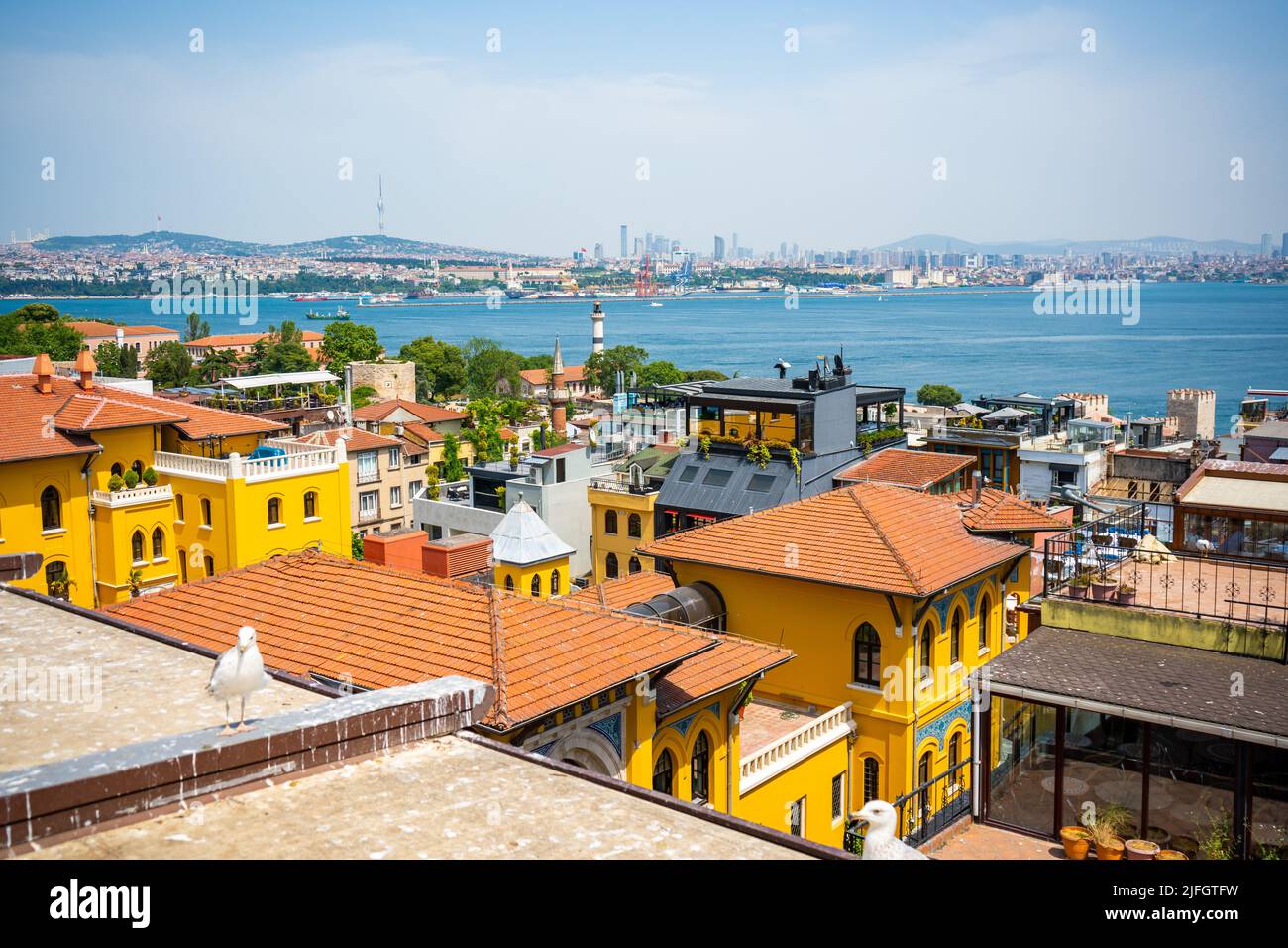View over roofs of the old town and the sea at sunrise in Istanbul ...