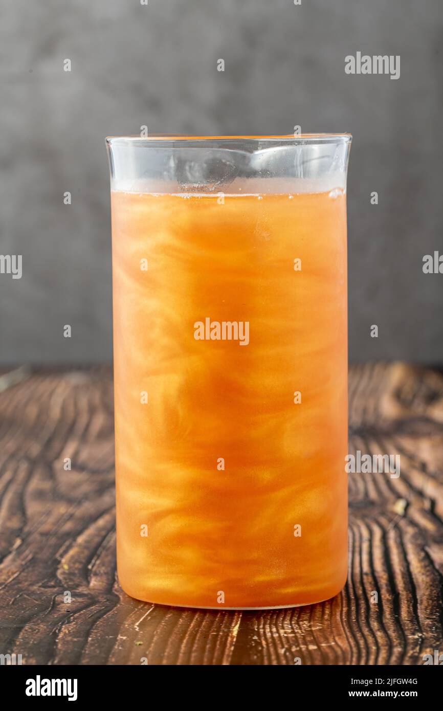 Cold icy drink with golden edible glitter or shimmer powder Stock Photo ...