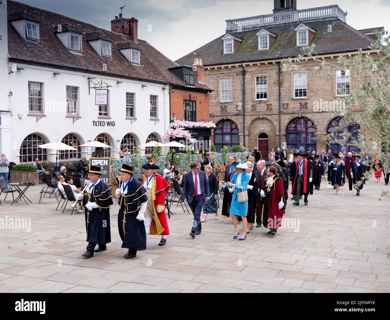 A procession through Warwick by members of civic office. Including the ...