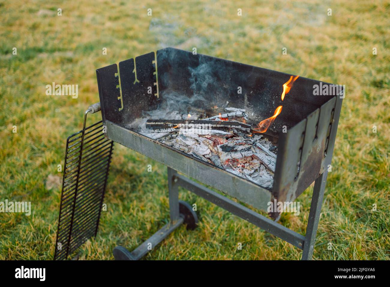 bbq grill flame, hot burning grill, outdoors cooking food. Grill flame ...