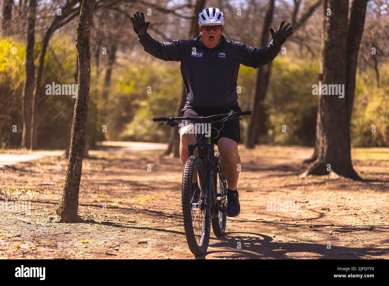 Riding without a helmet hi-res stock photography and images - Alamy