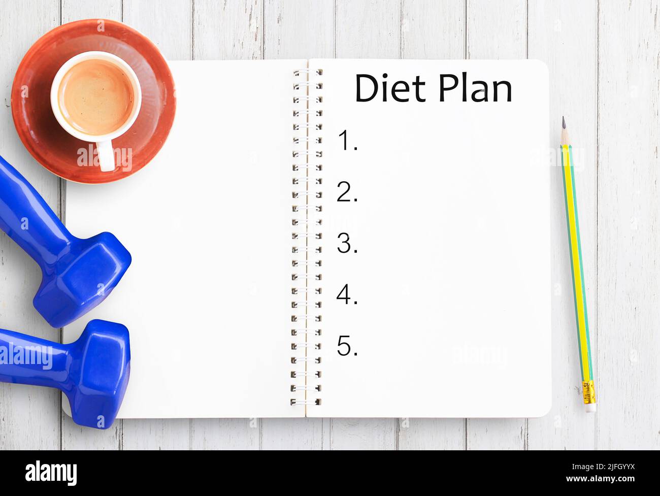 Top view of diet plan paper,pencil,cup of coffee and blue dumbbell on ...
