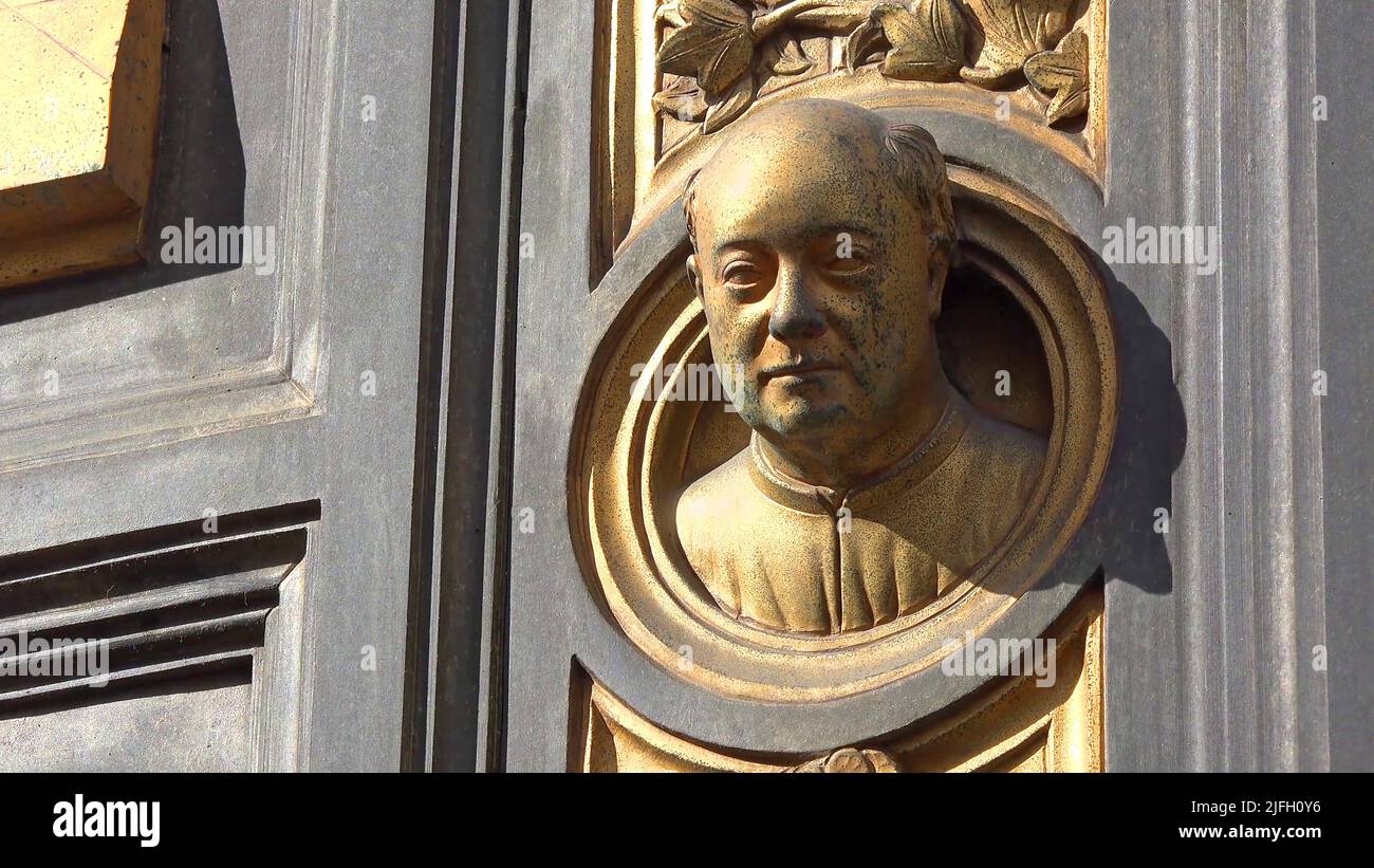The portrait in gilded bronze of Lorenzo Ghiberti in the Porta del ...