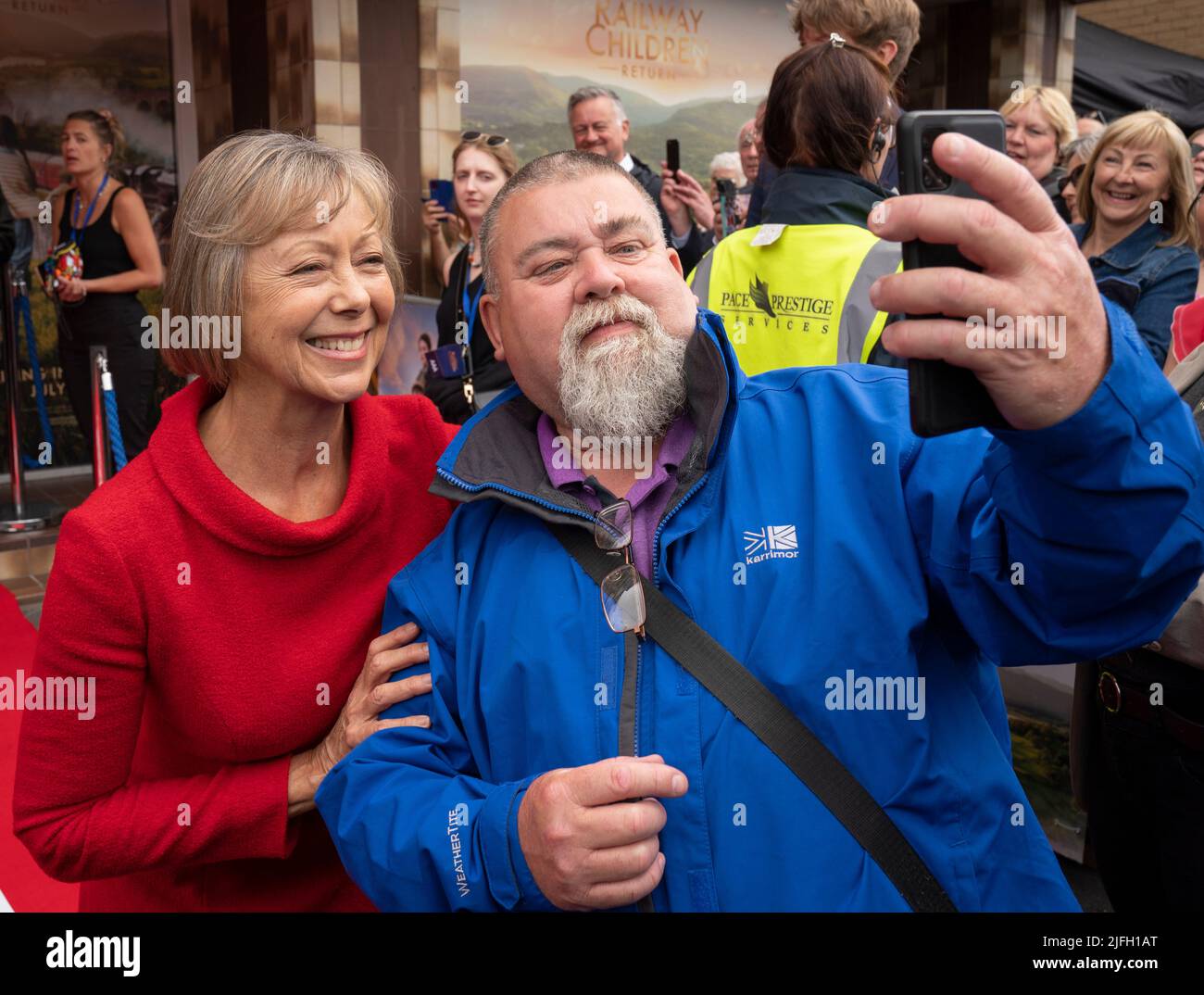 Jenny Agutter has her photograph taken with a fan as she attends the ...