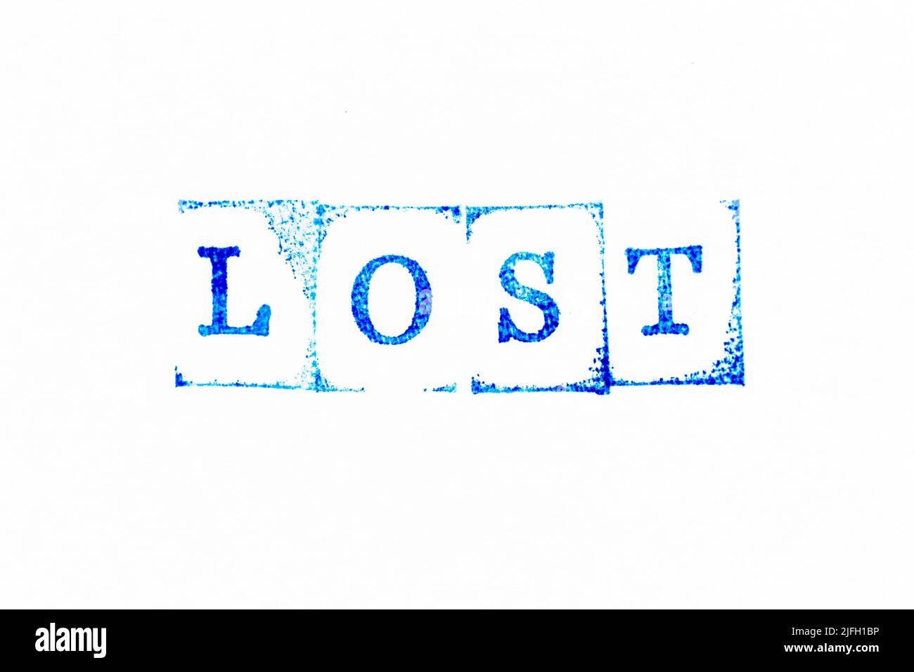 Blue color ink rubber stamp in word lost on white paper background ...
