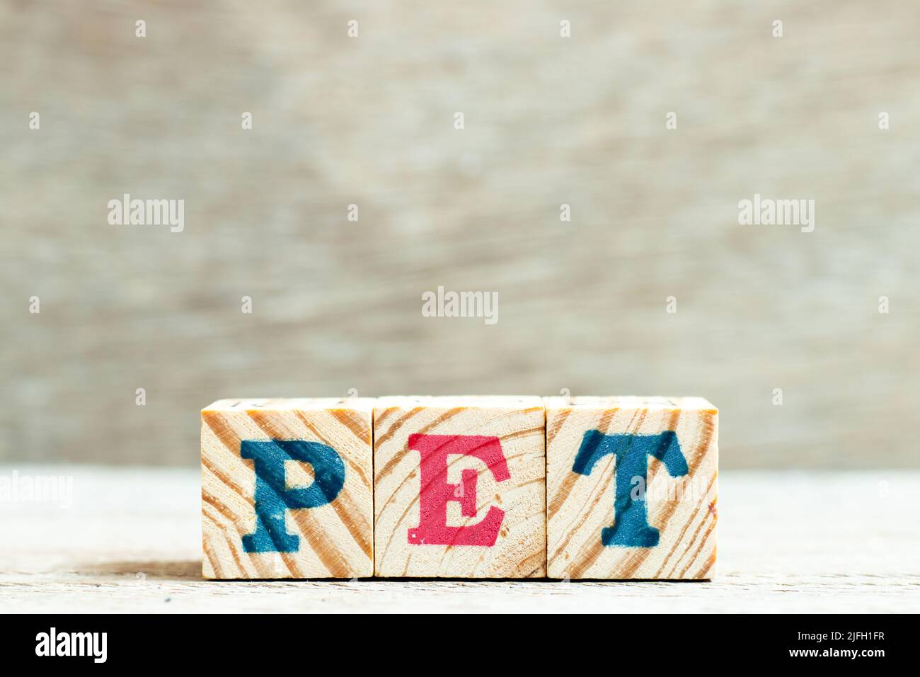 Alphabet letter block in word PET (animal or abbreviation of ...