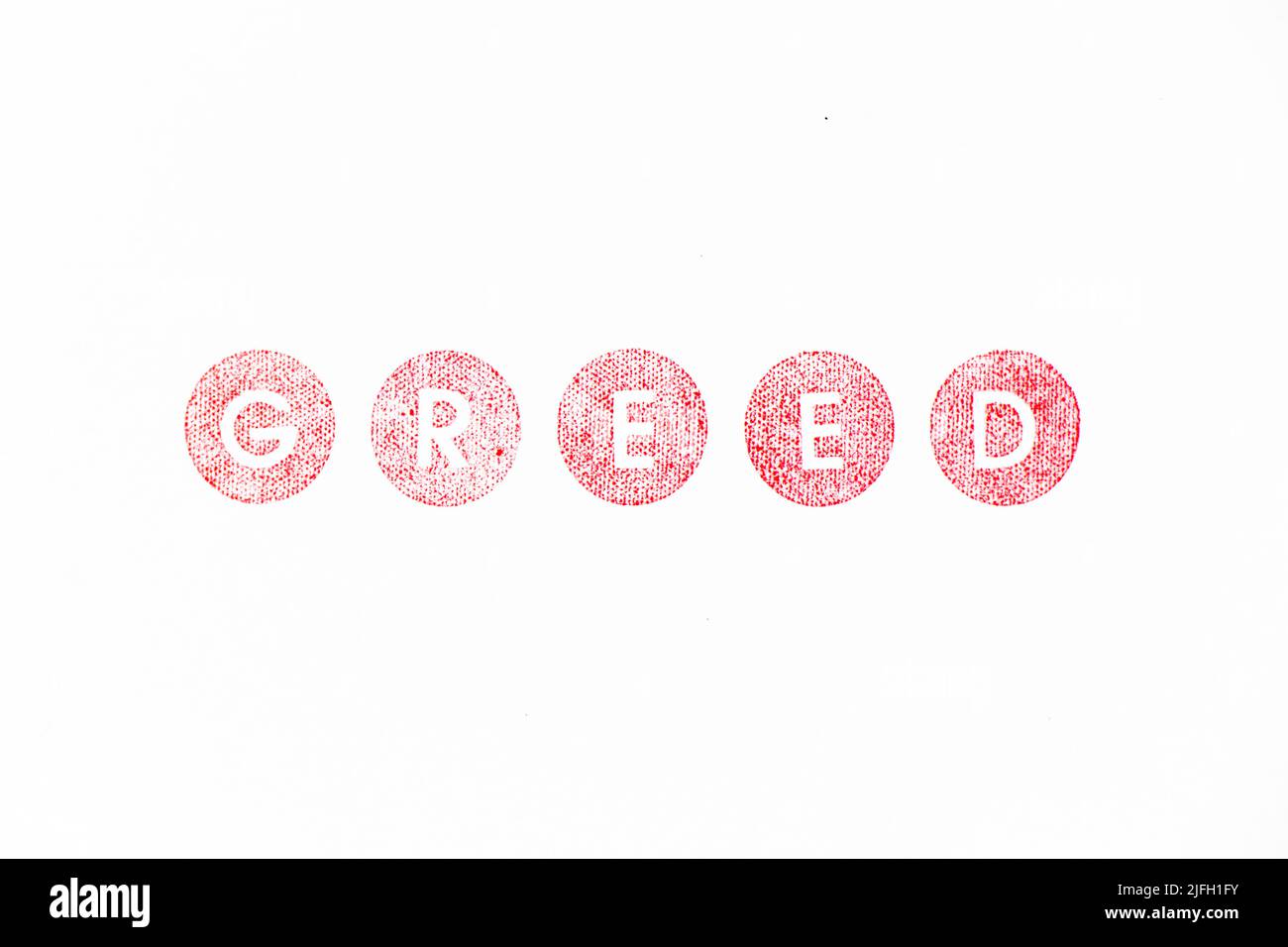 Red color rubber stamp in word greed on white paper background Stock ...
