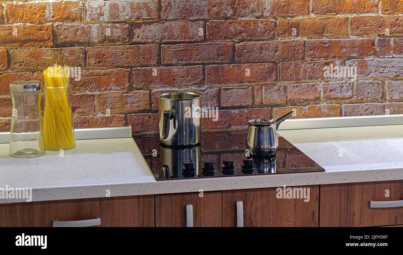 Ceramic stove built in modern kitchen counter top home cooking Stock ...