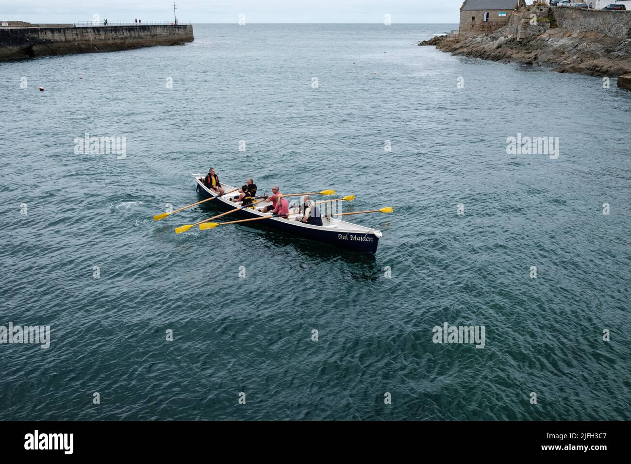 Gig Rowing Training in Porthleven, Cornwall Stock Photo - Alamy