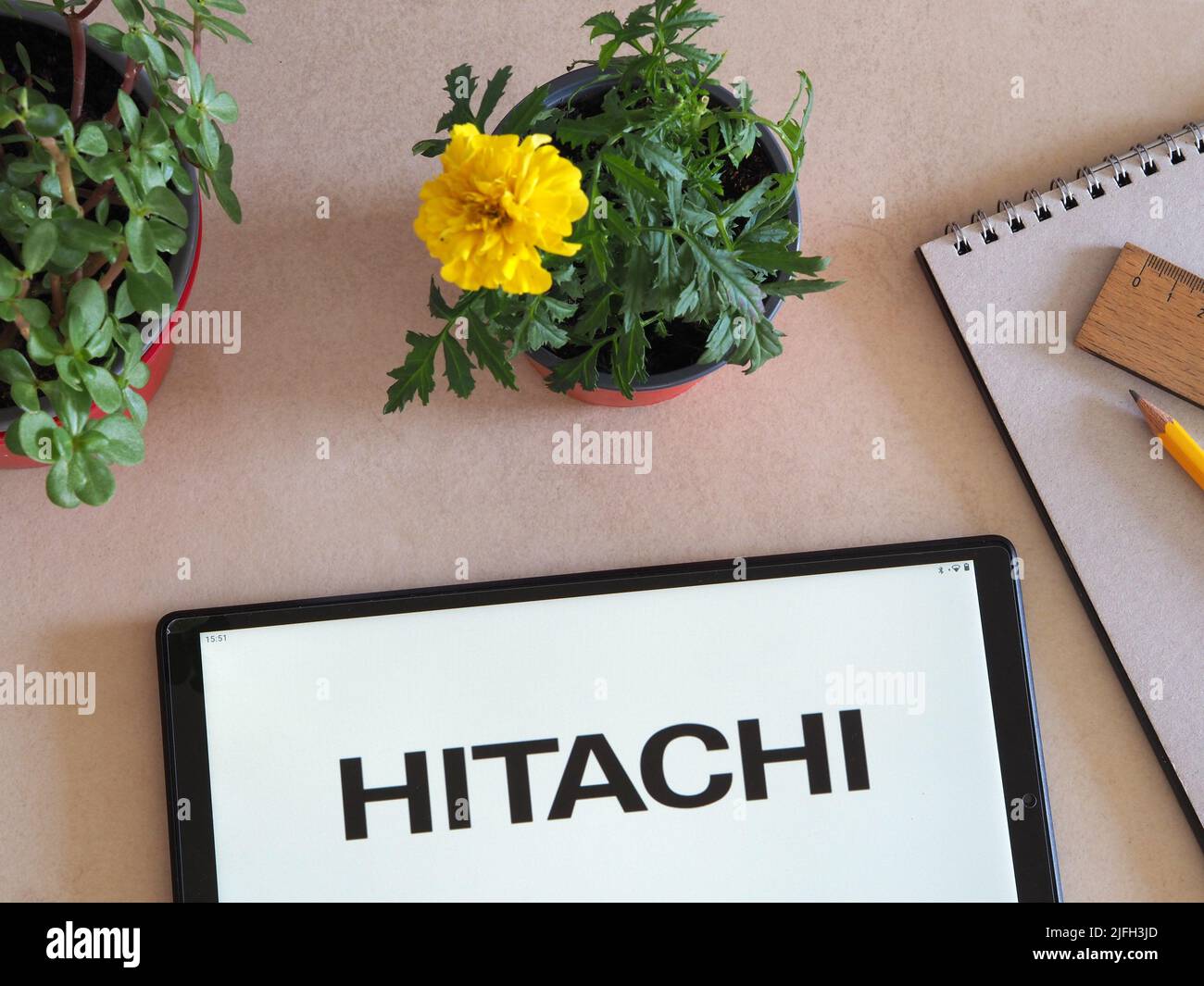 In this photo illustration Hitachi Ltd. logo seen displayed on a tablet ...