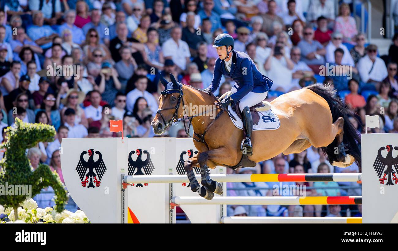 03 July 2022, North Rhine-Westphalia, Aachen: Equestrian sport, jumping ...
