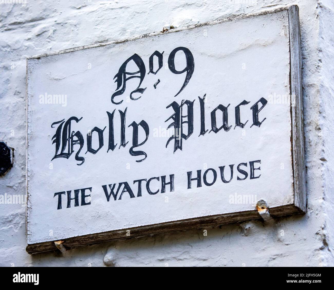 Vintage sign on the exterior of the building that used to be hampstead ...