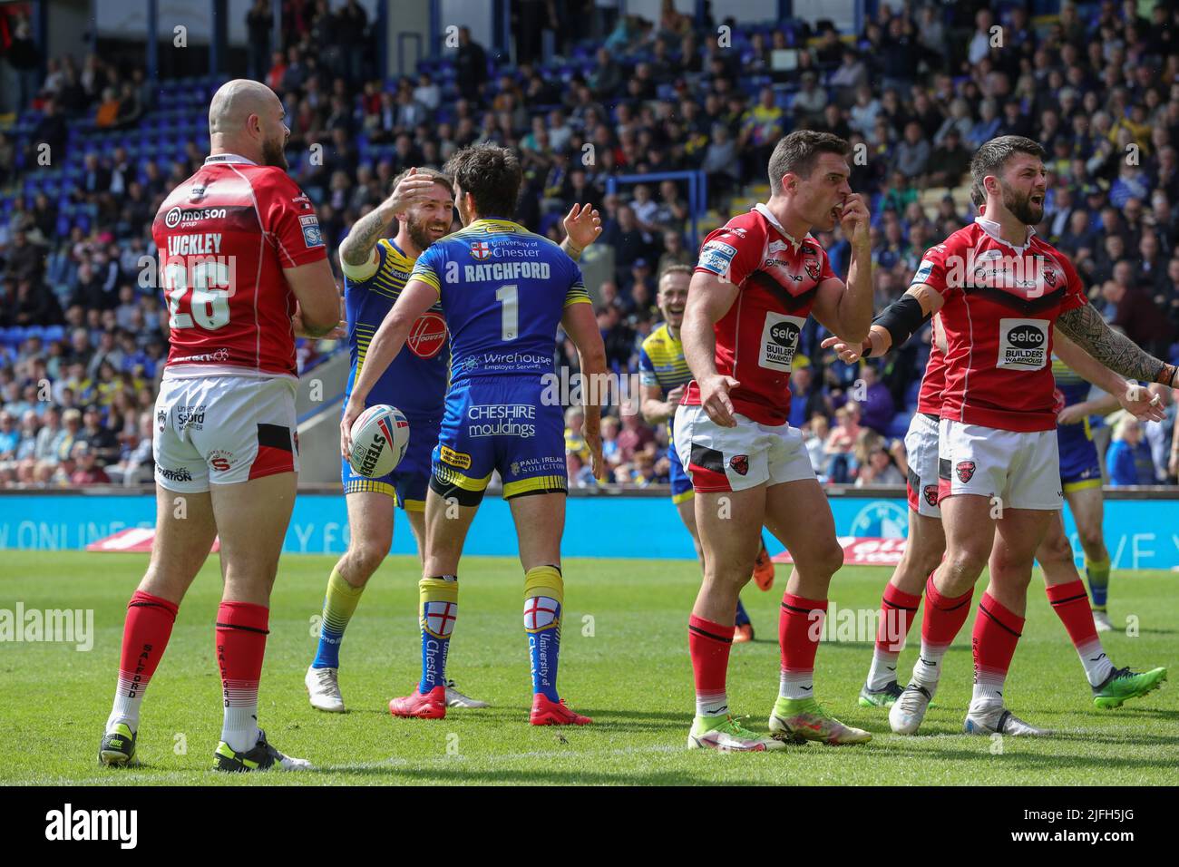 Stefan Ratchford #1 of Warrington Wolves celebrates his try and makes ...