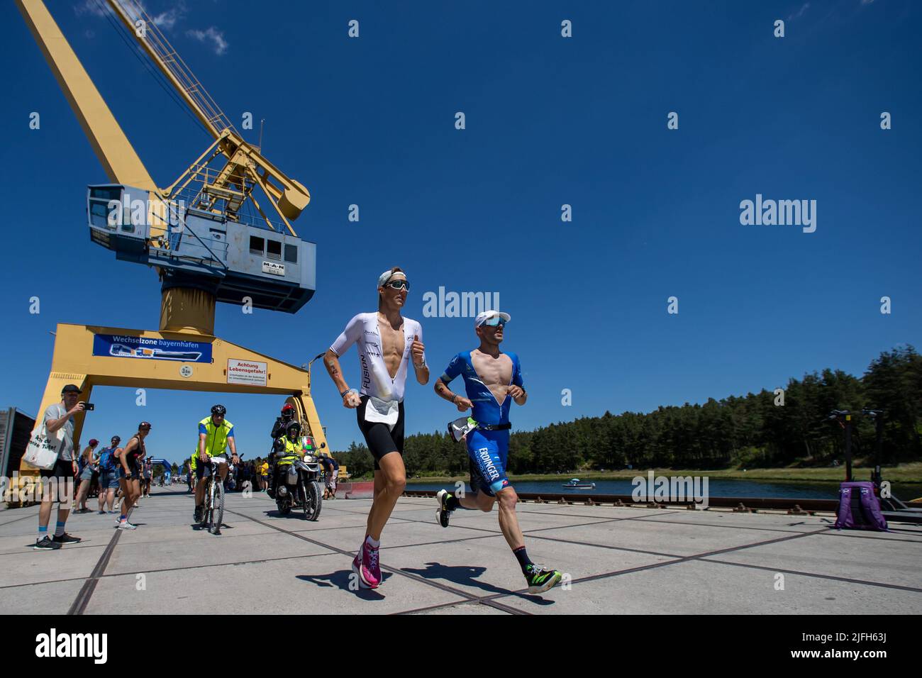 Roth, Germany. 03rd July, 2022. German triathlete Patrick Lange (r ...