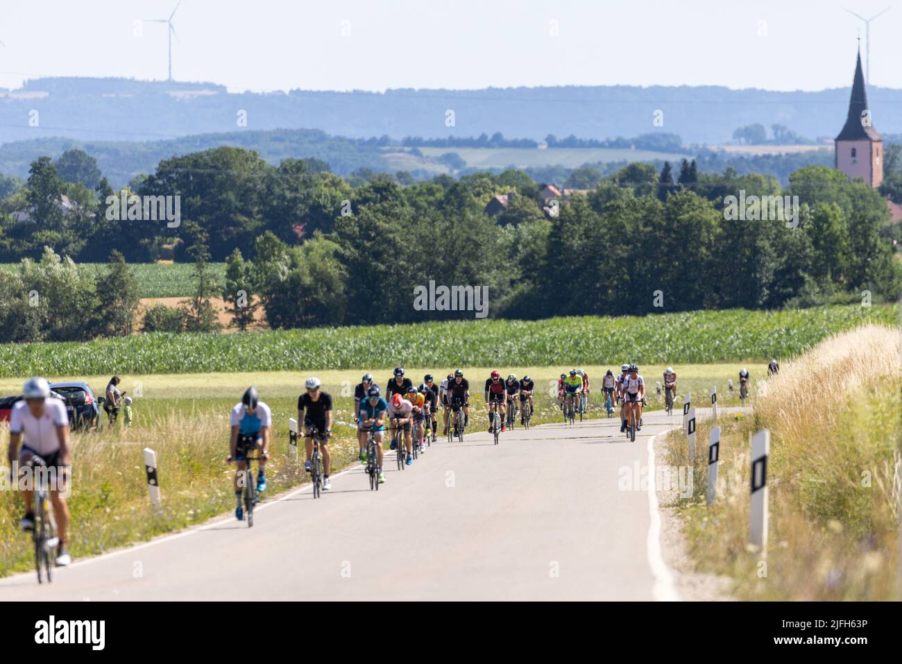 Hilpoltstein, Germany. 03rd July, 2022. Triathletes complete the bike ...