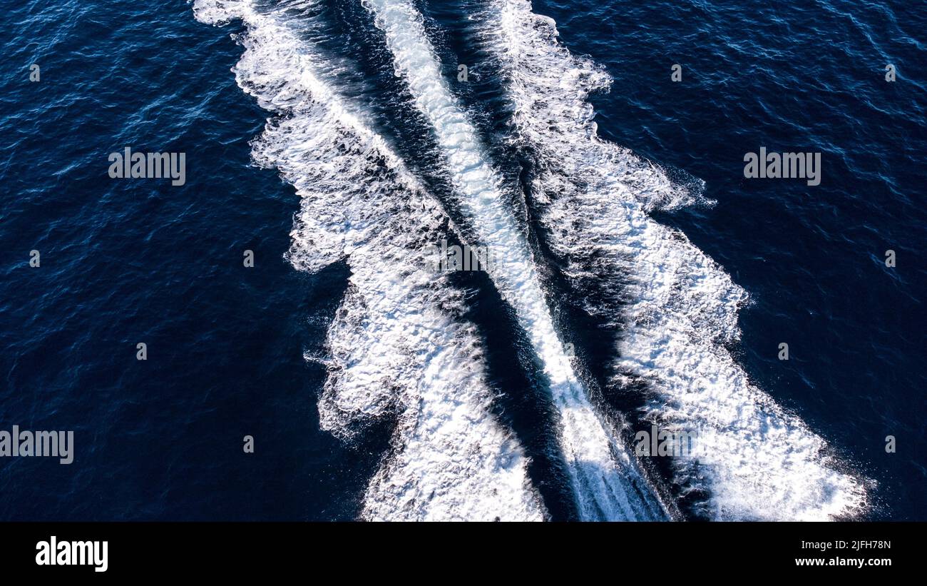 Boat tail on sea water Stock Photo - Alamy
