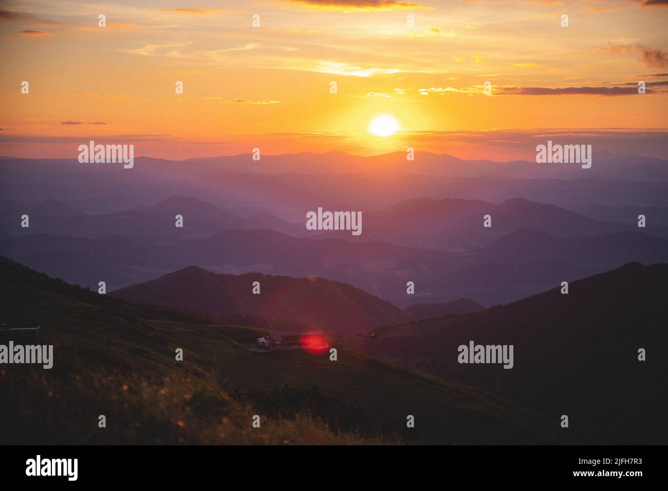 A sunset scene of grass fields and mountains in grayson highlands state ...
