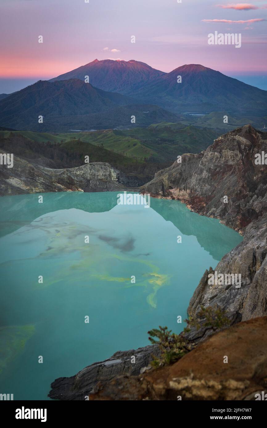 A beautiful view of Ijen Volcano complex in Indonesia under red sunset ...