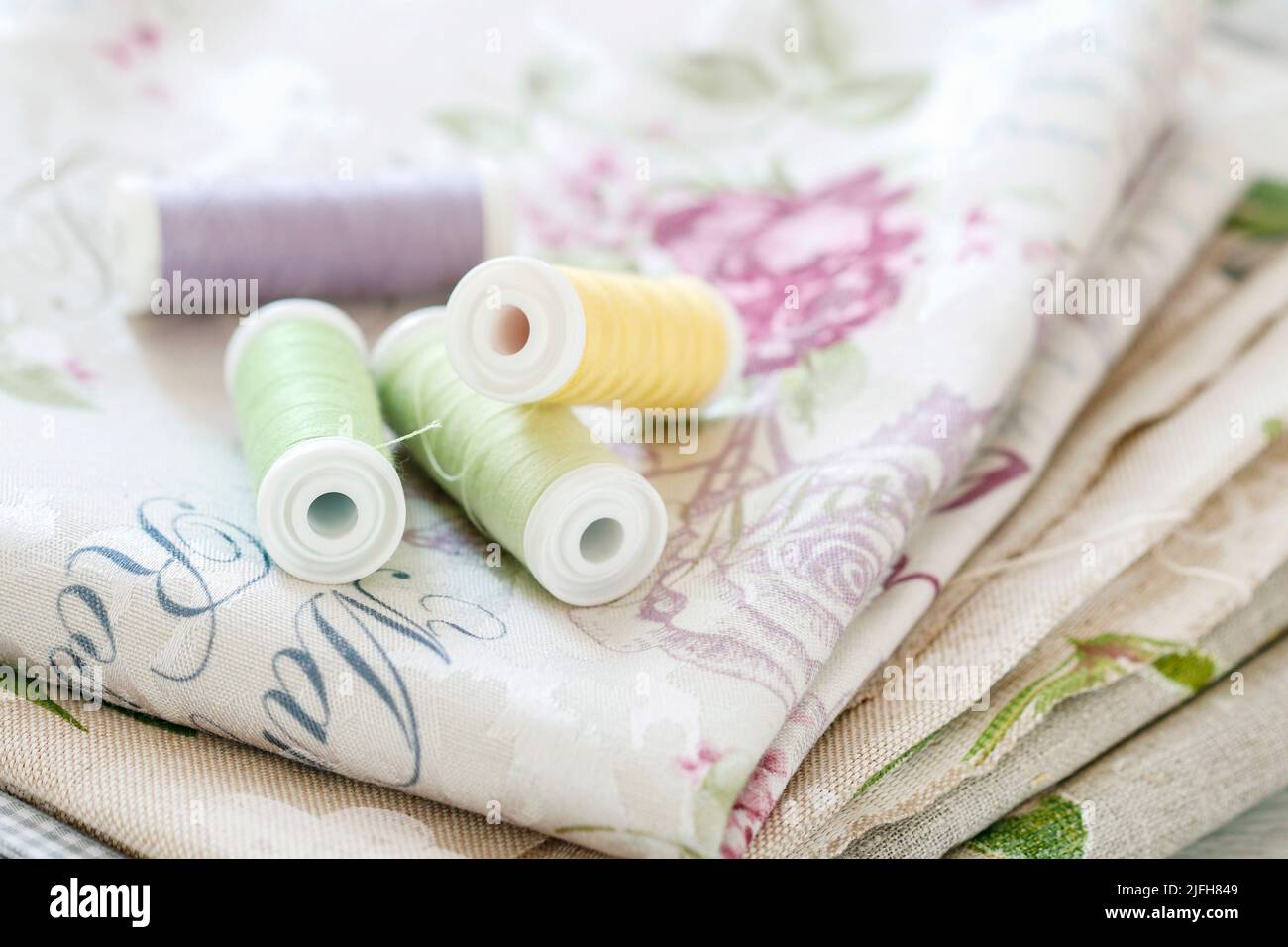 Fabrics and threads. Hobby time Stock Photo - Alamy