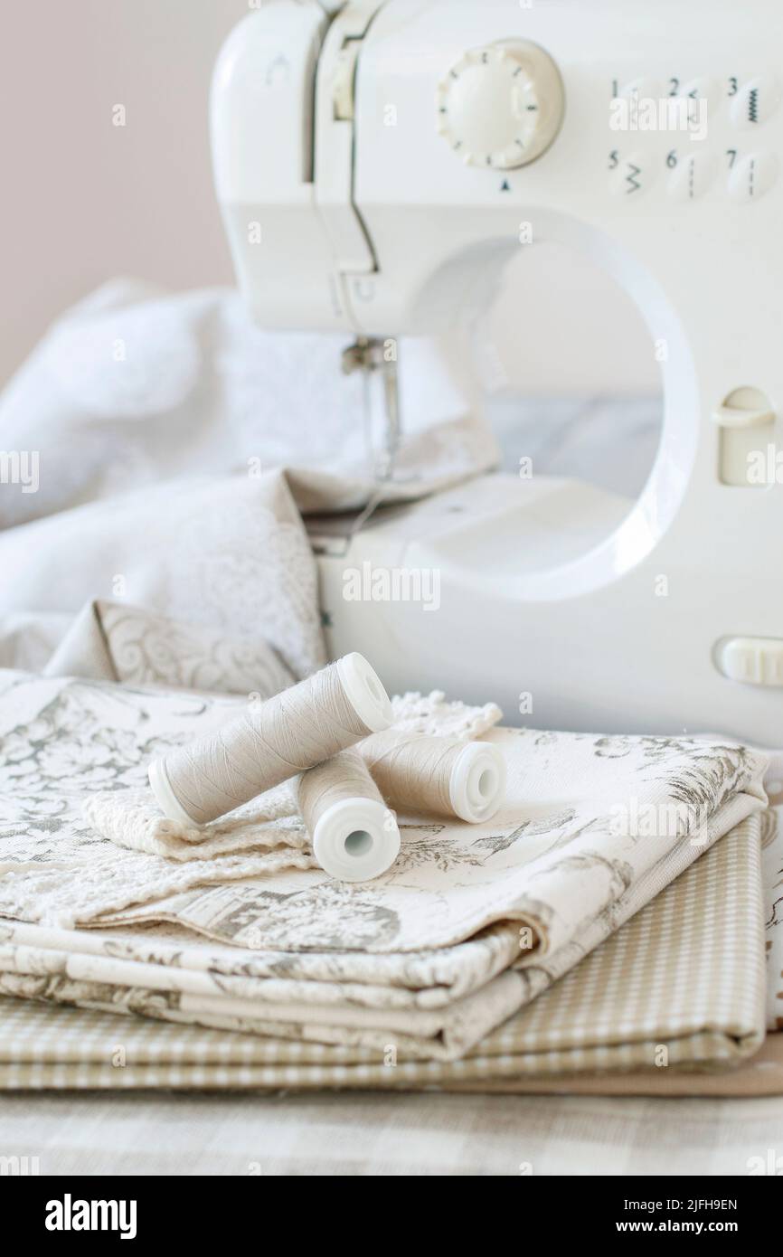 Home sewing machine, hobby time Stock Photo - Alamy