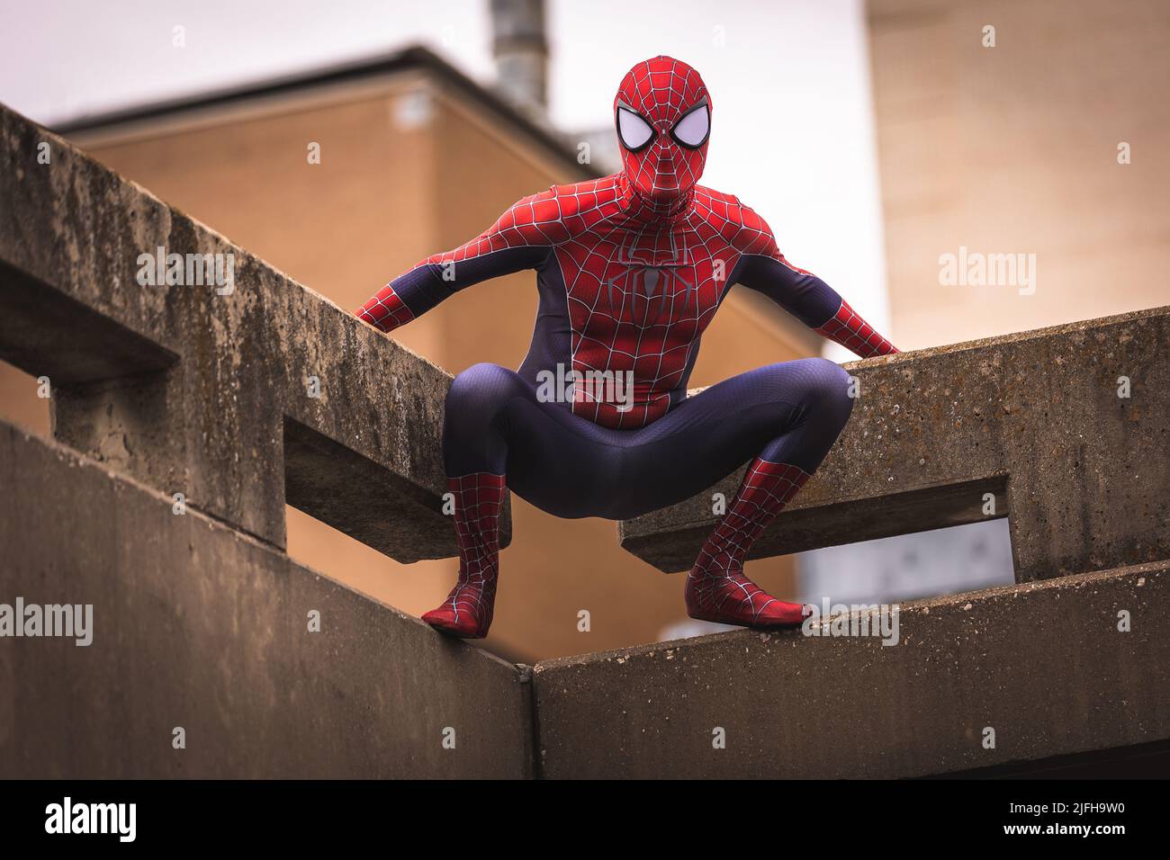 Spiderman sitting hi-res stock photography and images - Alamy
