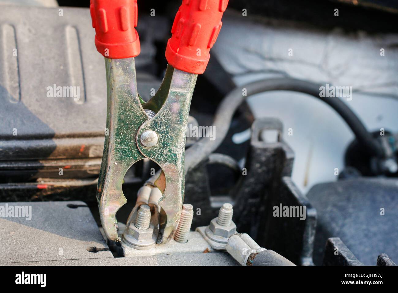 Jumper cable (booster cable), automotive repair Stock Photo - Alamy