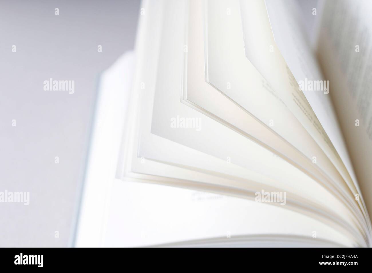 Pages in open book. reading time Stock Photo - Alamy