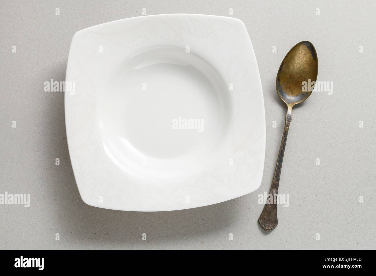 Top view empty plate. Idea of hunger Stock Photo - Alamy