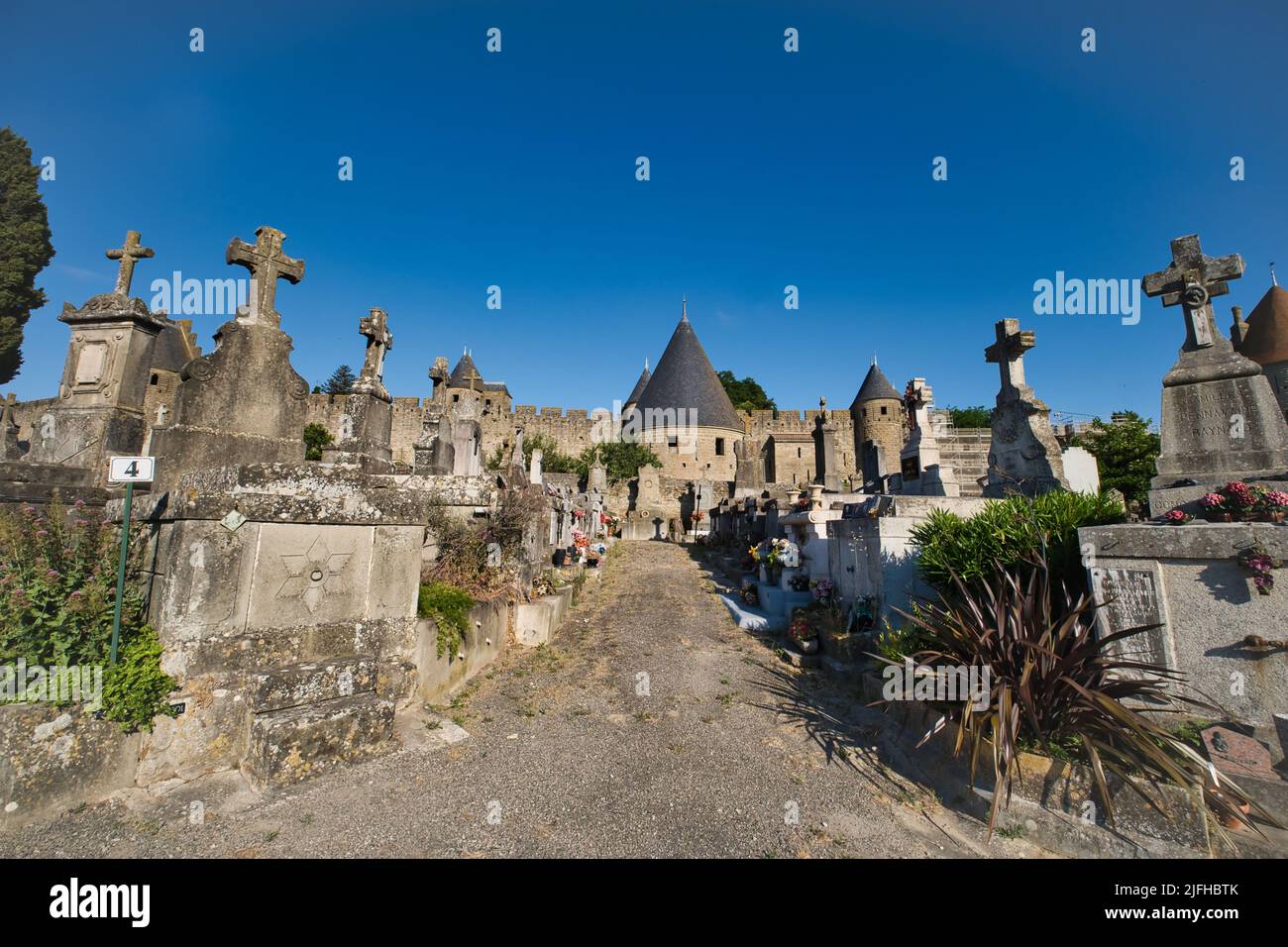 View of the tombstones at the cemetery de la Conte with on background ...