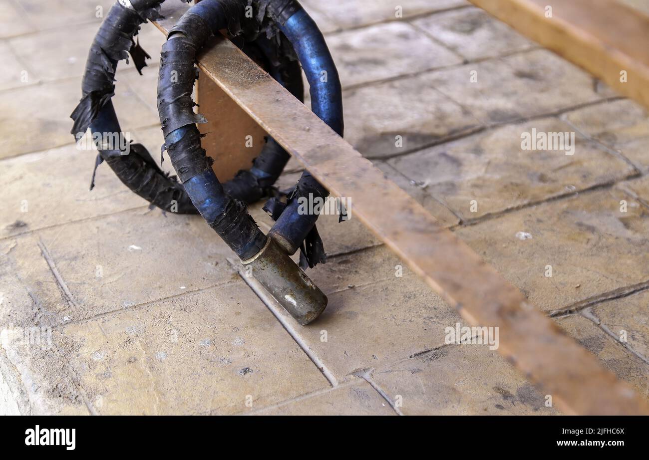 Security detail for bicycles on the street in the city Stock Photo - Alamy