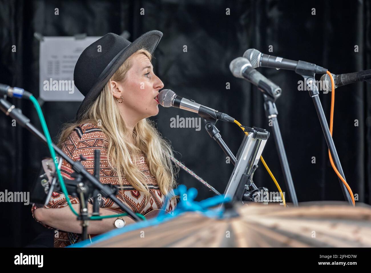 Close up of a Country & western band female singer performing in the ...