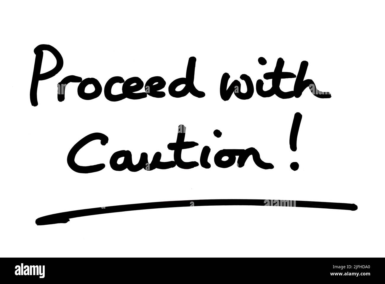 Proceed with caution! handwritten on a white background Stock Photo - Alamy