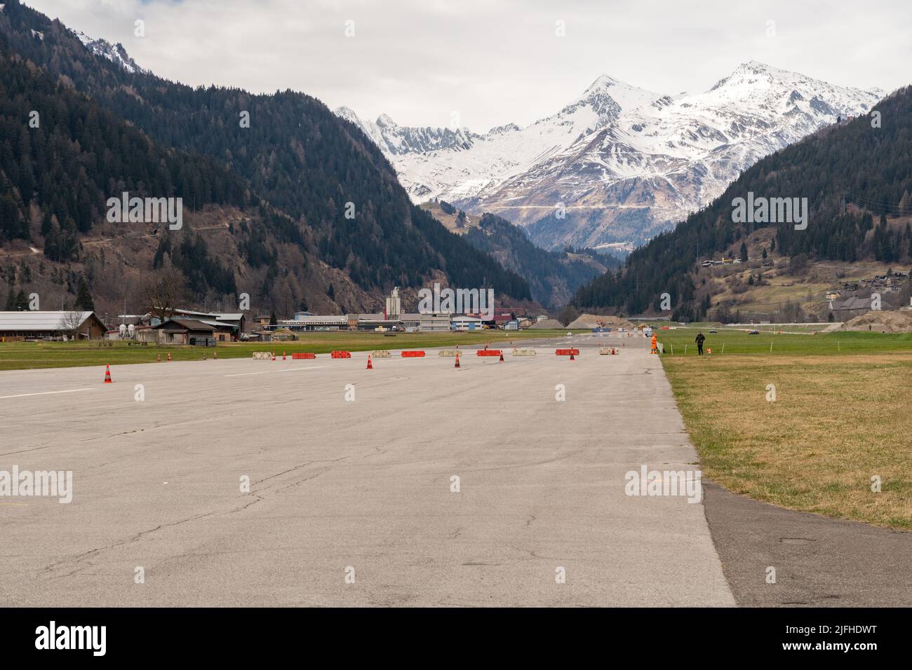 Ambri, Ticino, Switzerland, April 3, 2022 View over the runway strip at ...