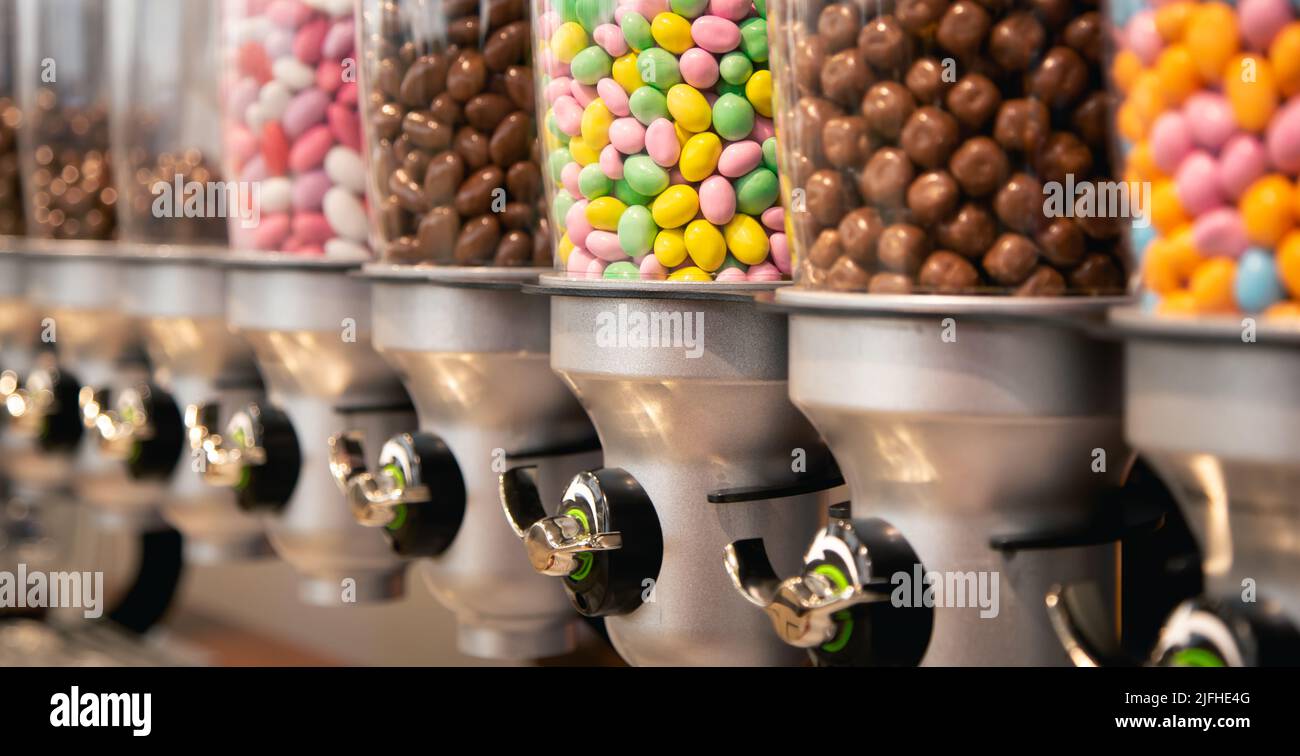 Bright candies in containers by weight in a candy store Stock Photo - Alamy