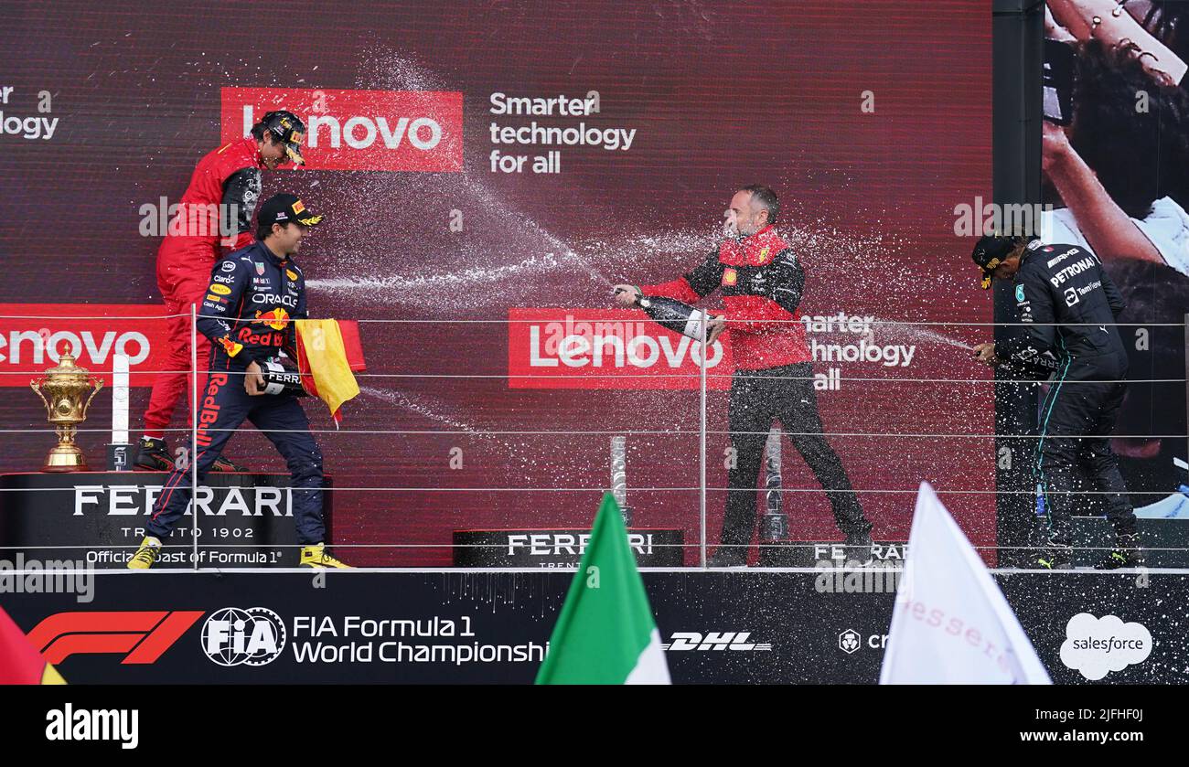 Race winner Carlos Sainz of Ferrari (top left) with Red Bull's Sergio ... Race winner Carlos Sainz of Ferrari (top left) with Red Bull's Sergio ...